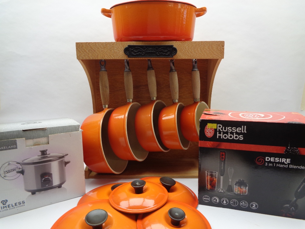 LE CREUSET CAST IRON PAN SET & ASSOCIATED HANGING RACK and two further ...