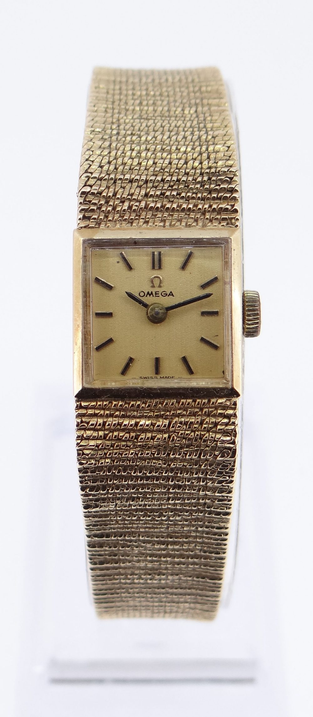 9CT GOLD OMEGA LADIES WRISTWATCH, the square dial having baton markers ...