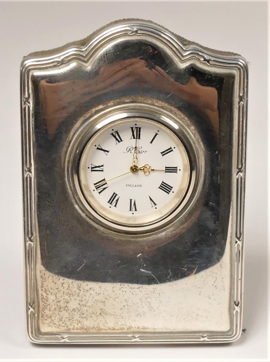 Two silver R.Carr Clockmaker, England, bedside clocks.