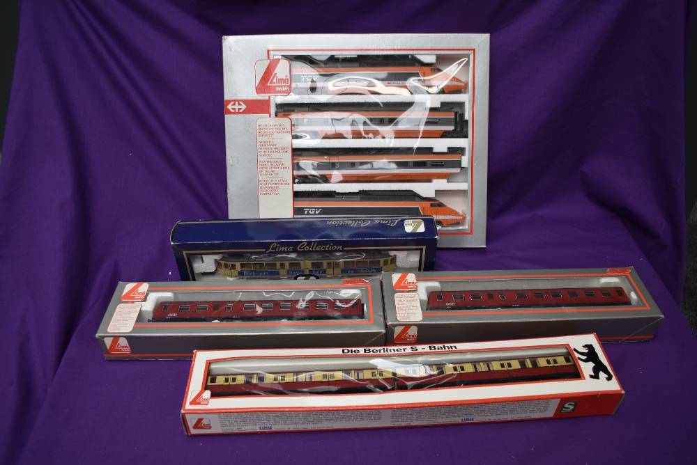 A small collection of Lima 00 gauge comprising TGV SNCF Passenger Train ...
