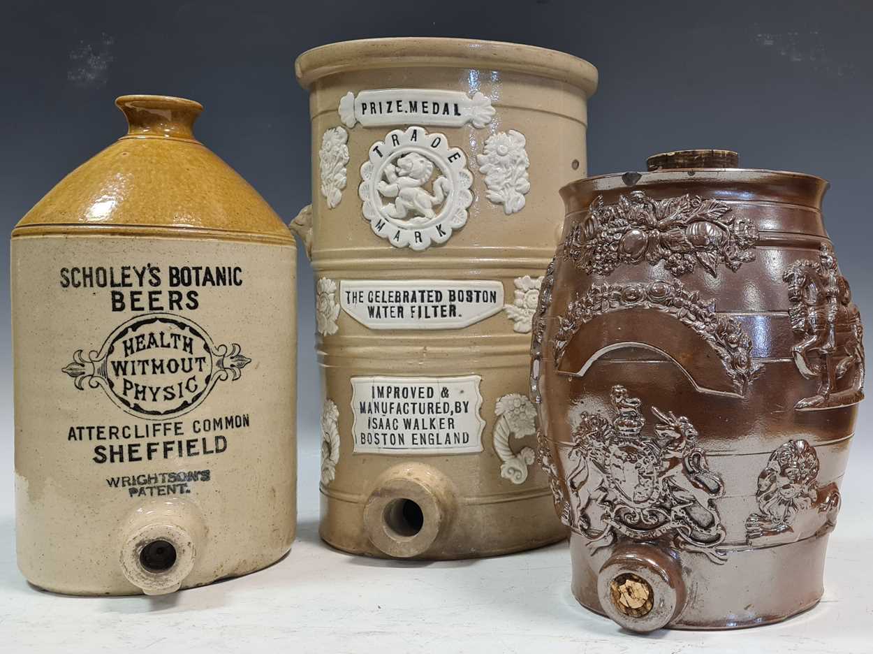 A 19th century saltglazed spirit barrel, a Boston pottery water filter ...