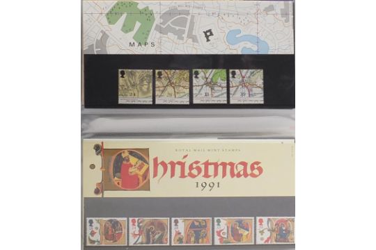 Royal Mail presentation packs arranged in an album, various ...