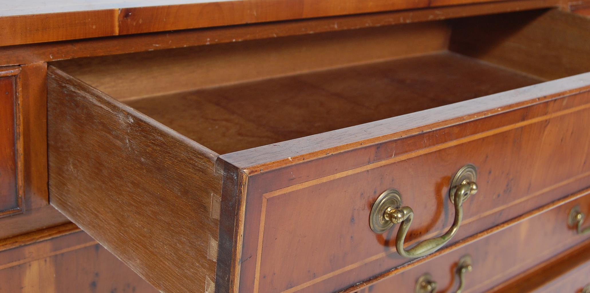 A Bevan Funnel Limited 'Reprodux' reproduction yew wood chest of ...
