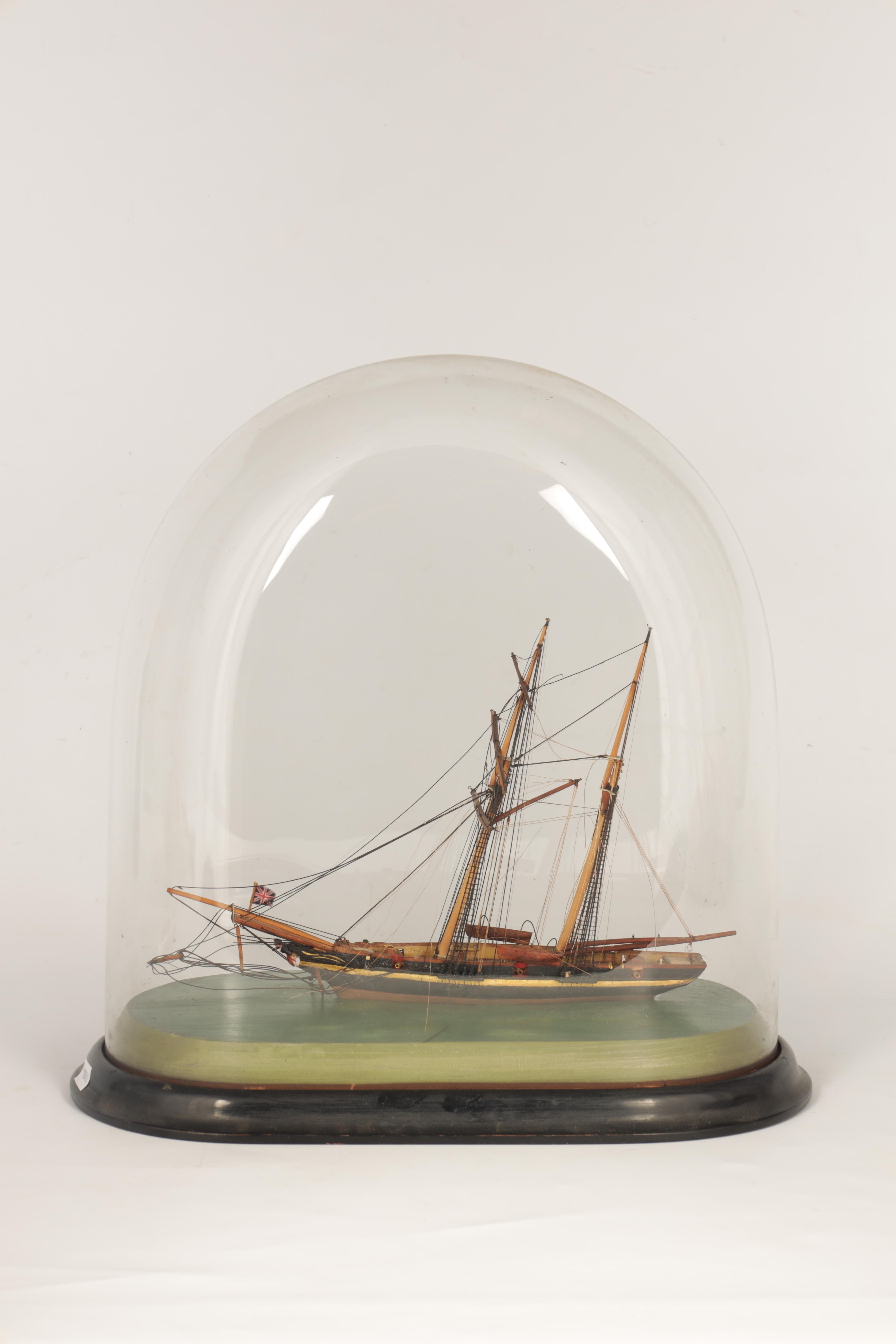 A 19TH CENTURY DIORAMA MODEL OF A SHIP mounted on a painted moulded ...