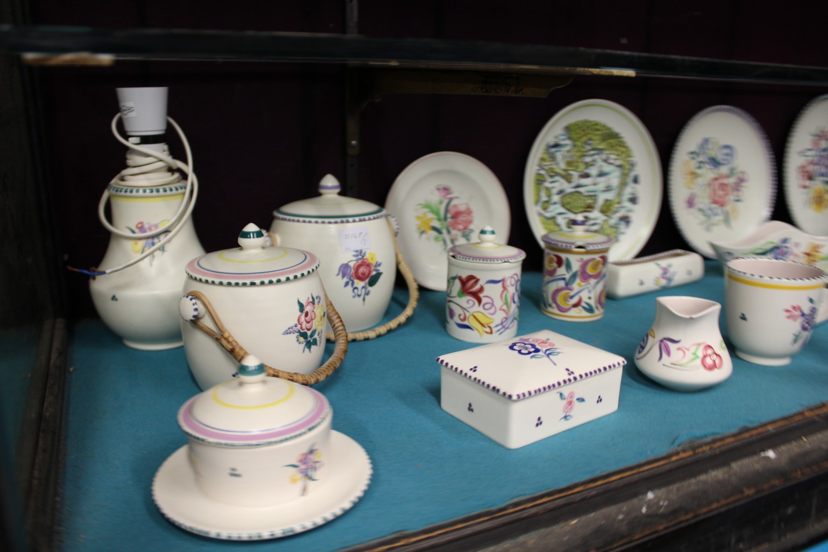 A good collection of Poole pottery china to include plates vases bowls ...