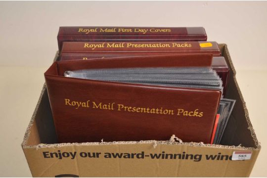 A collection of four Royal Mail presentation packs, first day covers to ...
