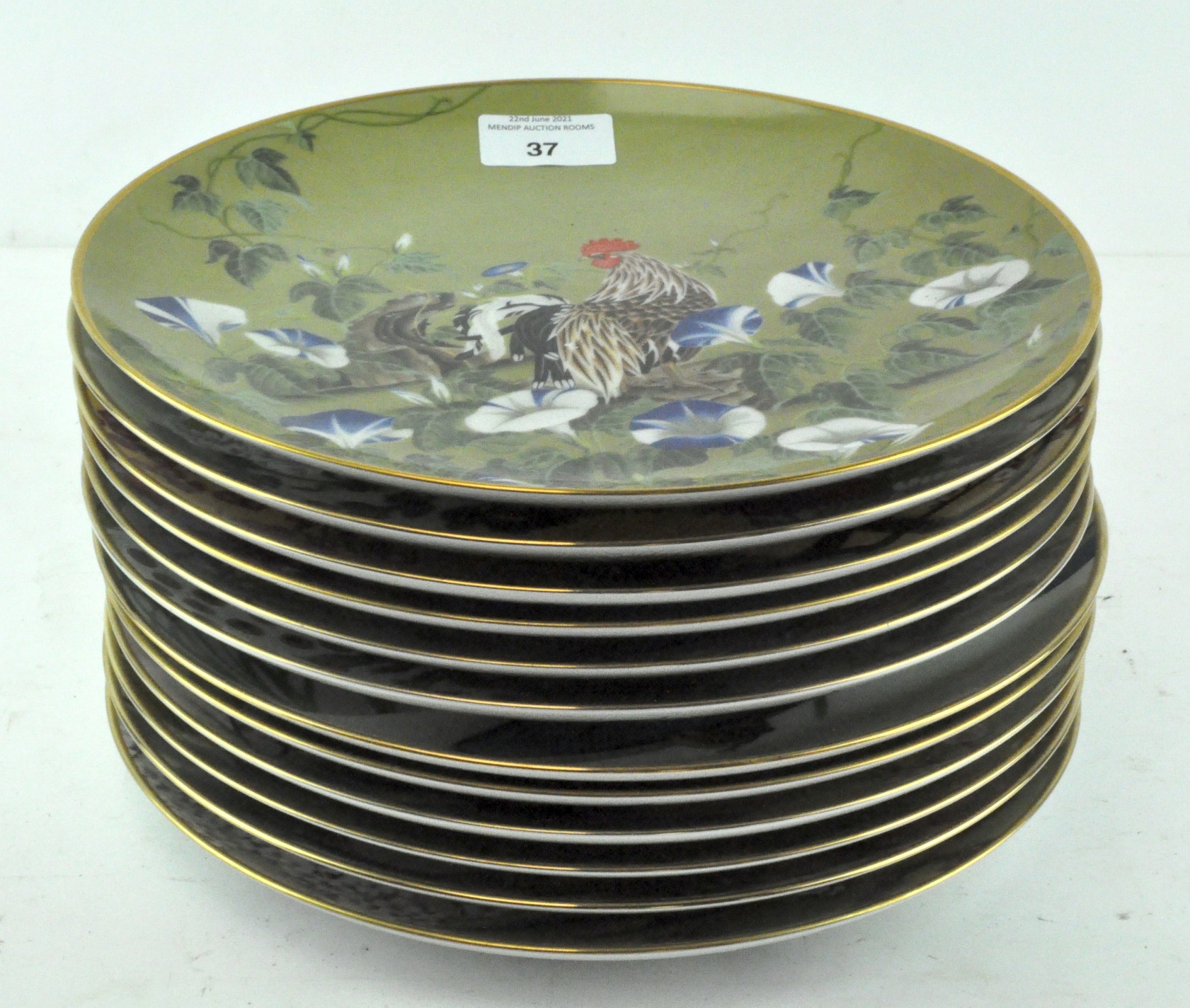 A collection of twelve Japanese collectors plates, 26cm diameter