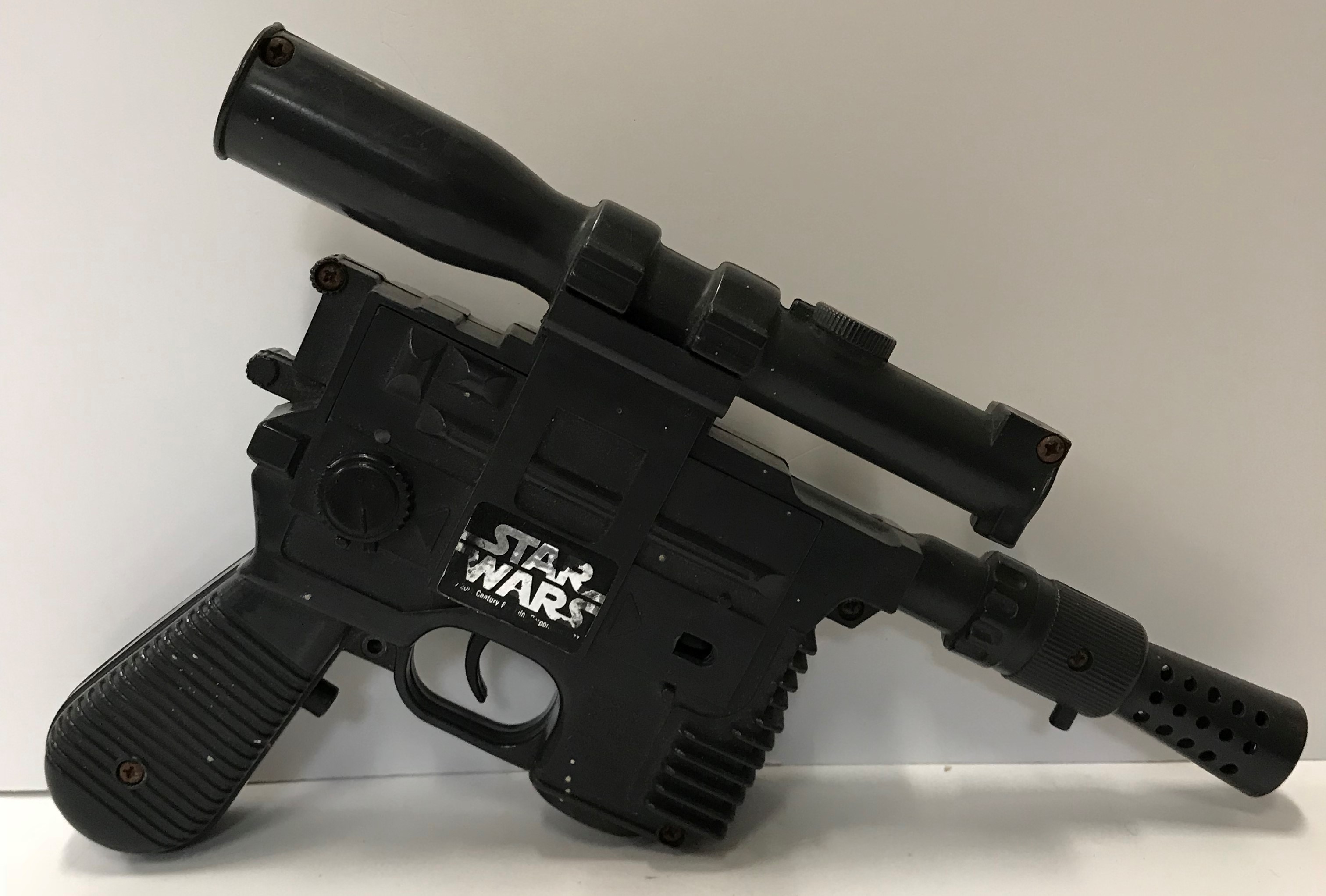 A Star Wars Hans Solo blaster pistol with Star Wars logo copyright 1977 ...