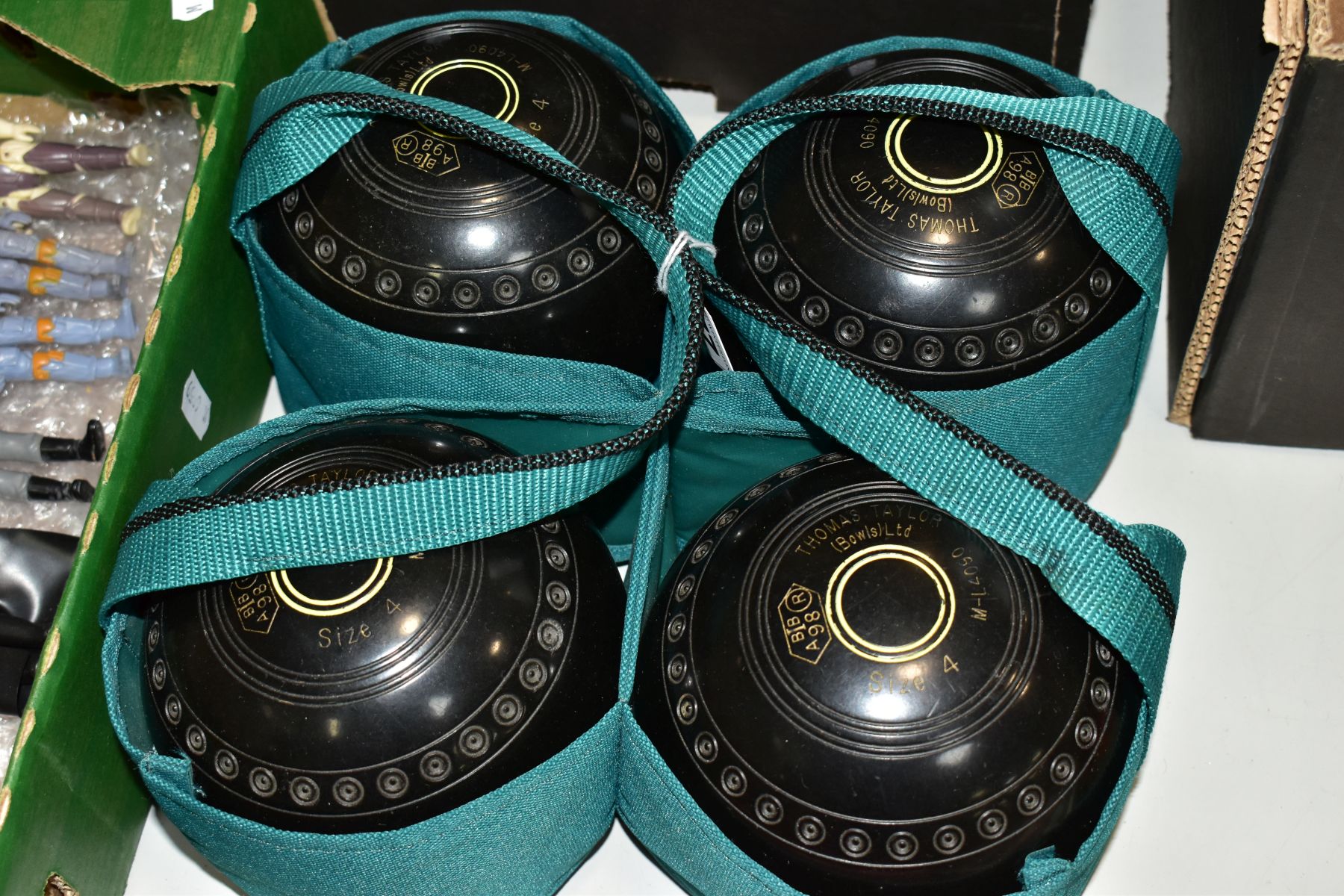 FOUR THOMAS TAYLOR LIGNOID SIZE 4 BOWLS, No M-L4090, have been used but ...