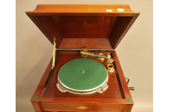An Edwardian inlaid mahogany Cliftophone gramophone cabinet with ...