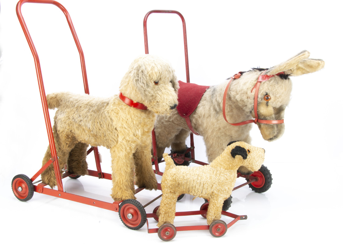 Three British post-war wheeled animals, a Chiltern dog on wheels with ...