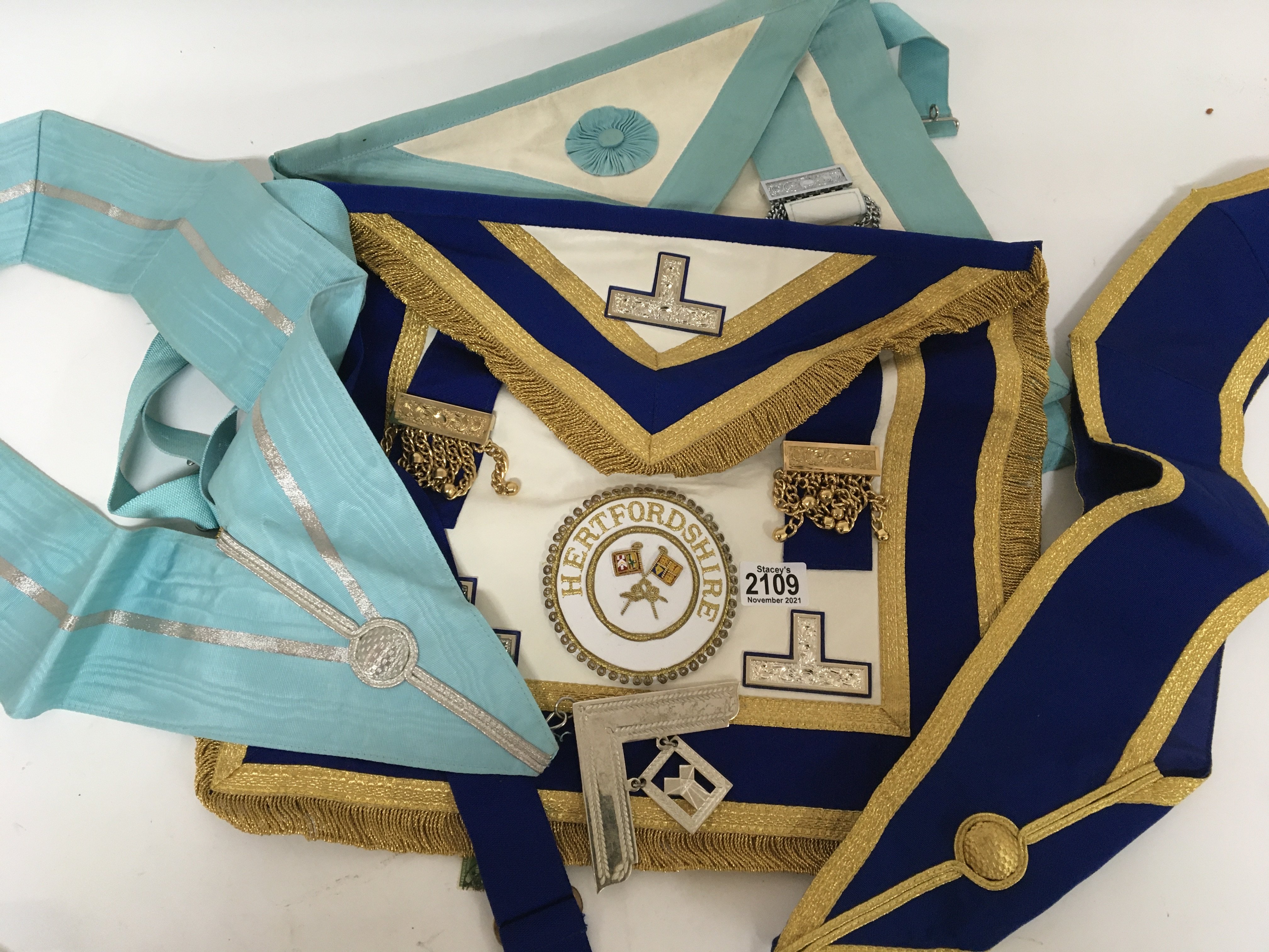 A collection of Masonic regalia collar jewel aprons in good condition ...