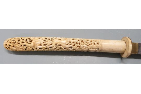 Burmese dha ivory handled sword circa 1900, with ornate carved grip ...