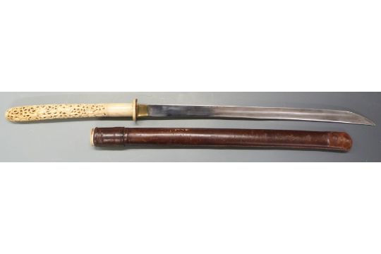 Burmese dha ivory handled sword circa 1900, with ornate carved grip ...