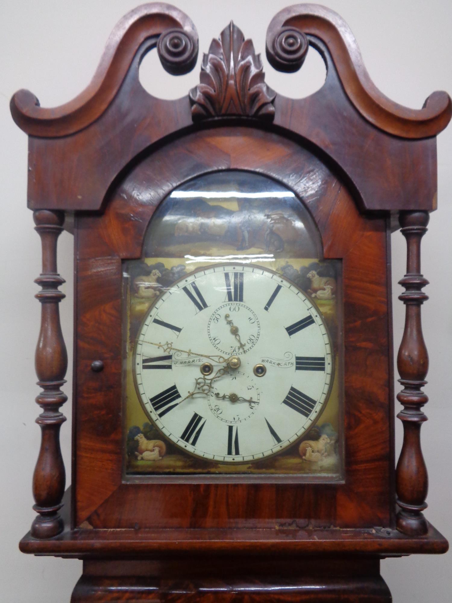 A 19th century mahogany longcase clock with painted dial signed J ...