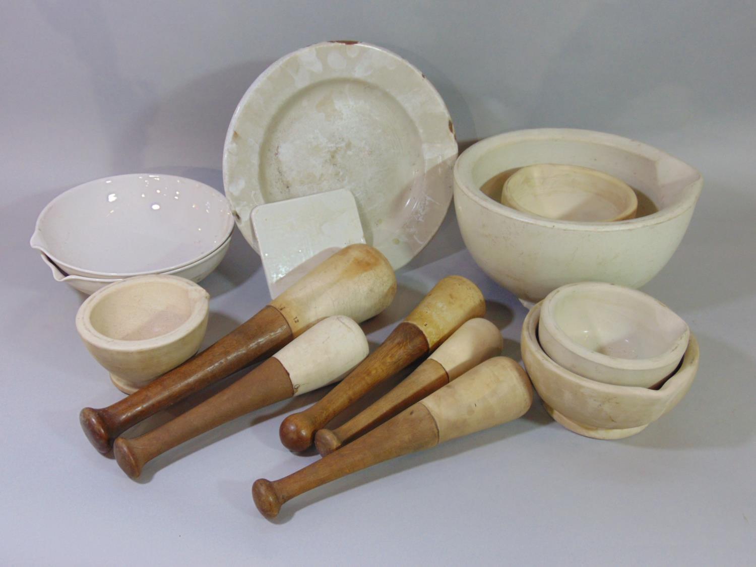 A collection of apothecary related items including graduated pestles ...