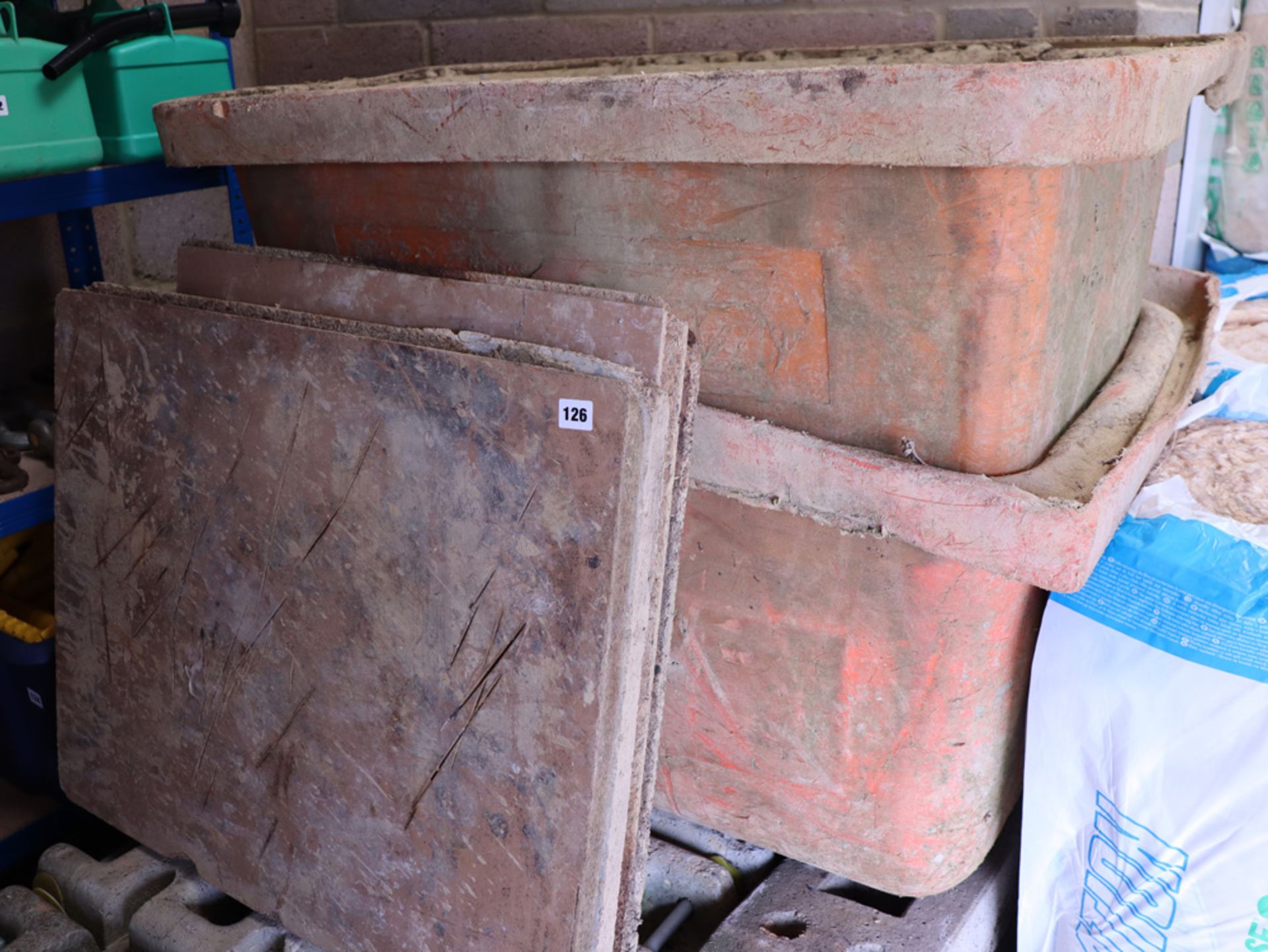 2 large builders muck tubs and boards for cement mixing