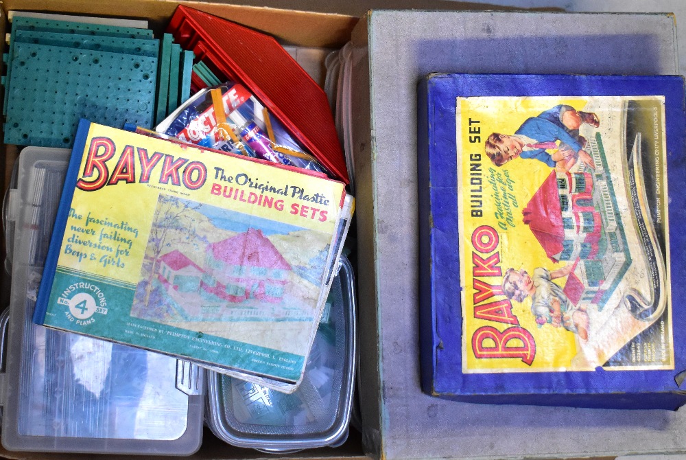 BAYKO; a boxed Bayko building set no.3, together with three boxed ...