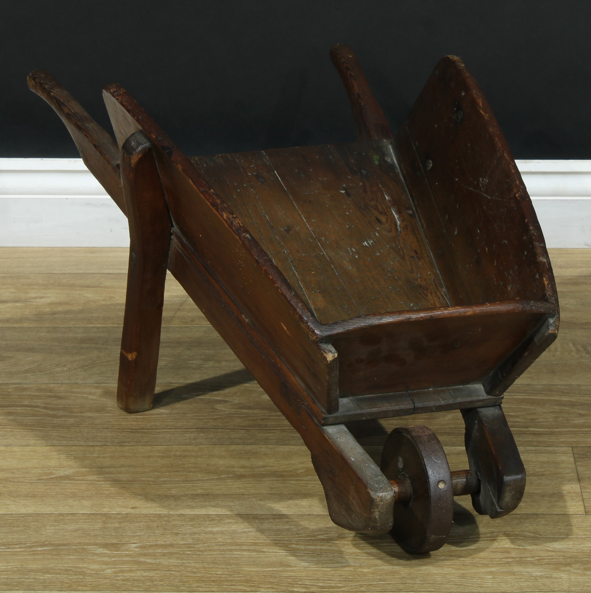 A 19th century child's country house wheelbarrow, iron-bound wheel ...