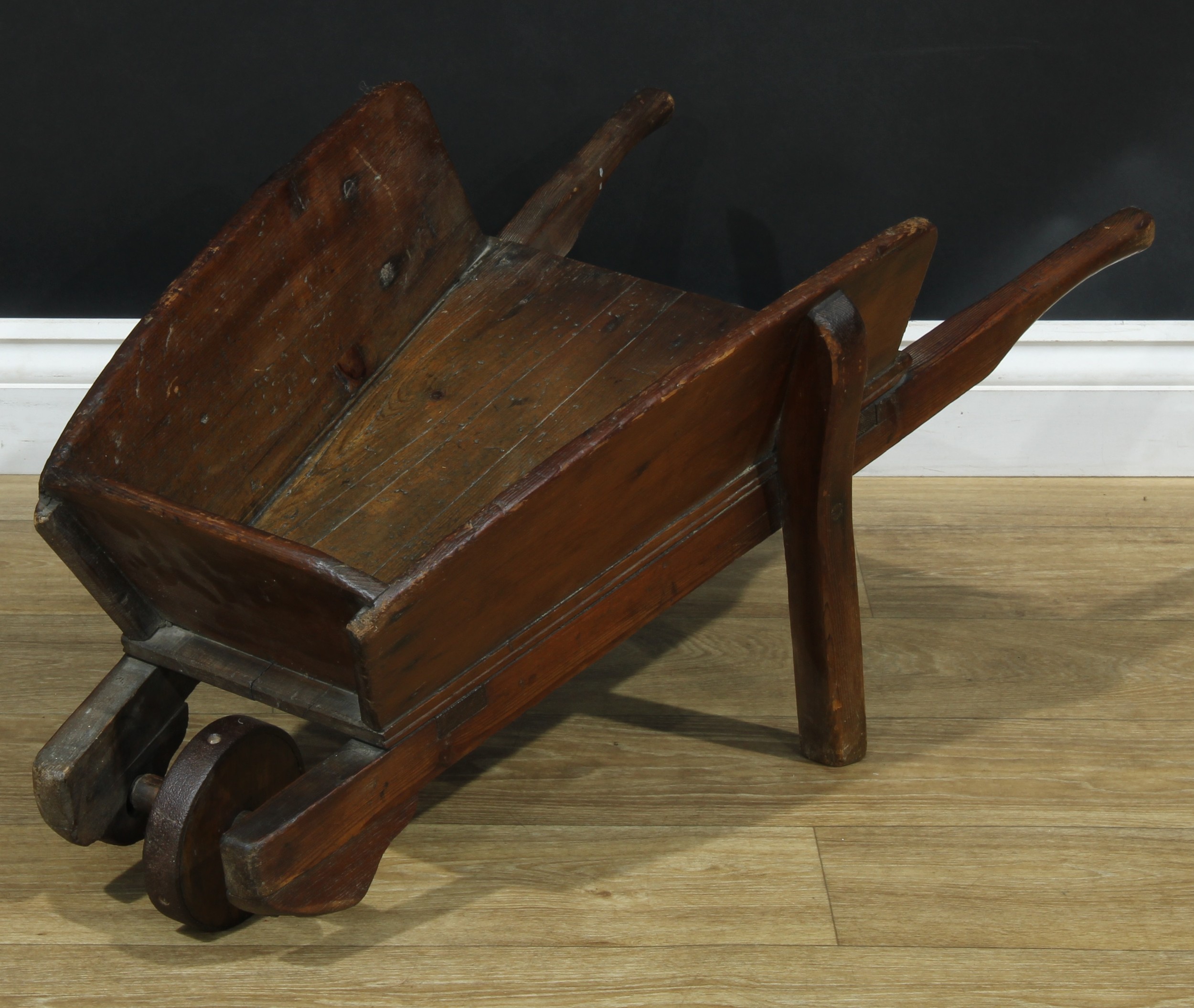 A 19th century child's country house wheelbarrow, iron-bound wheel ...