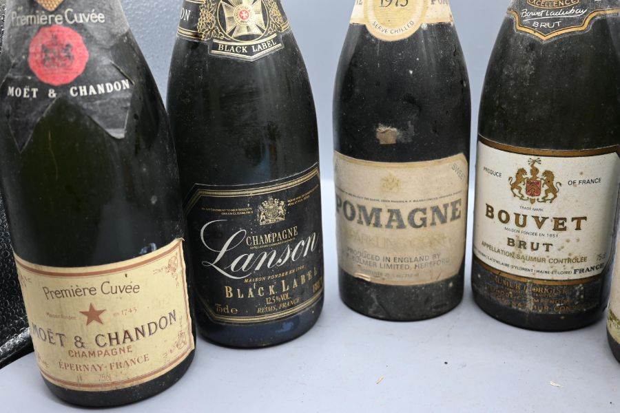 7 bottles of Champaign to include Moet & Chandon, two Pomagne, Piper ...