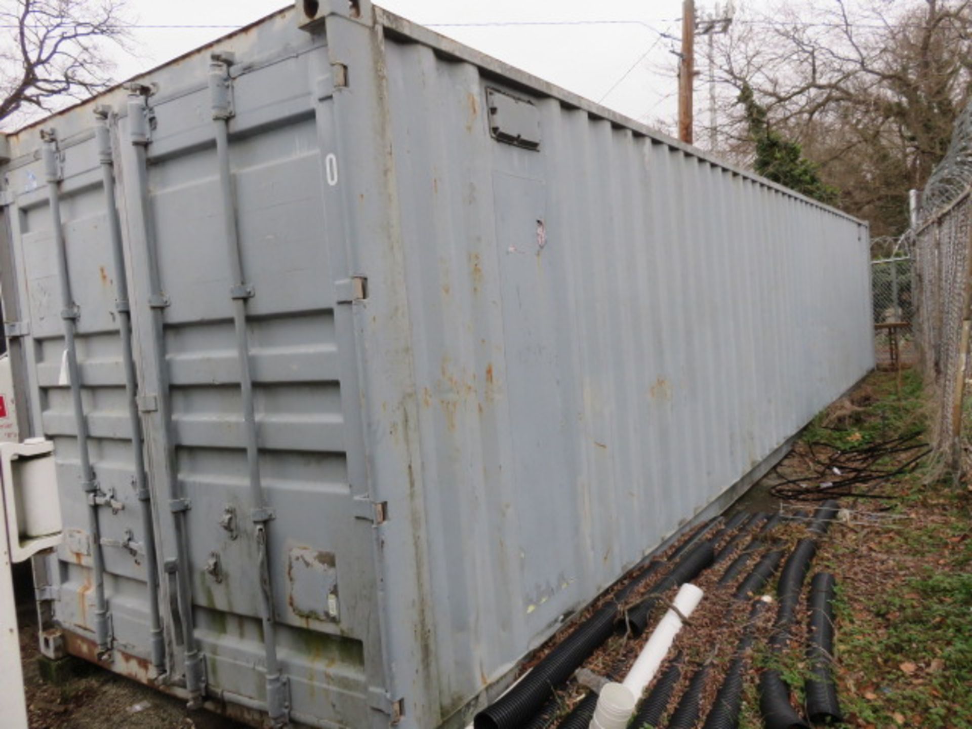 40 FT. SEA CARGO STORAGE CONTAINER WITH (2) SECTIONS OF 4 FT. PALLET ...