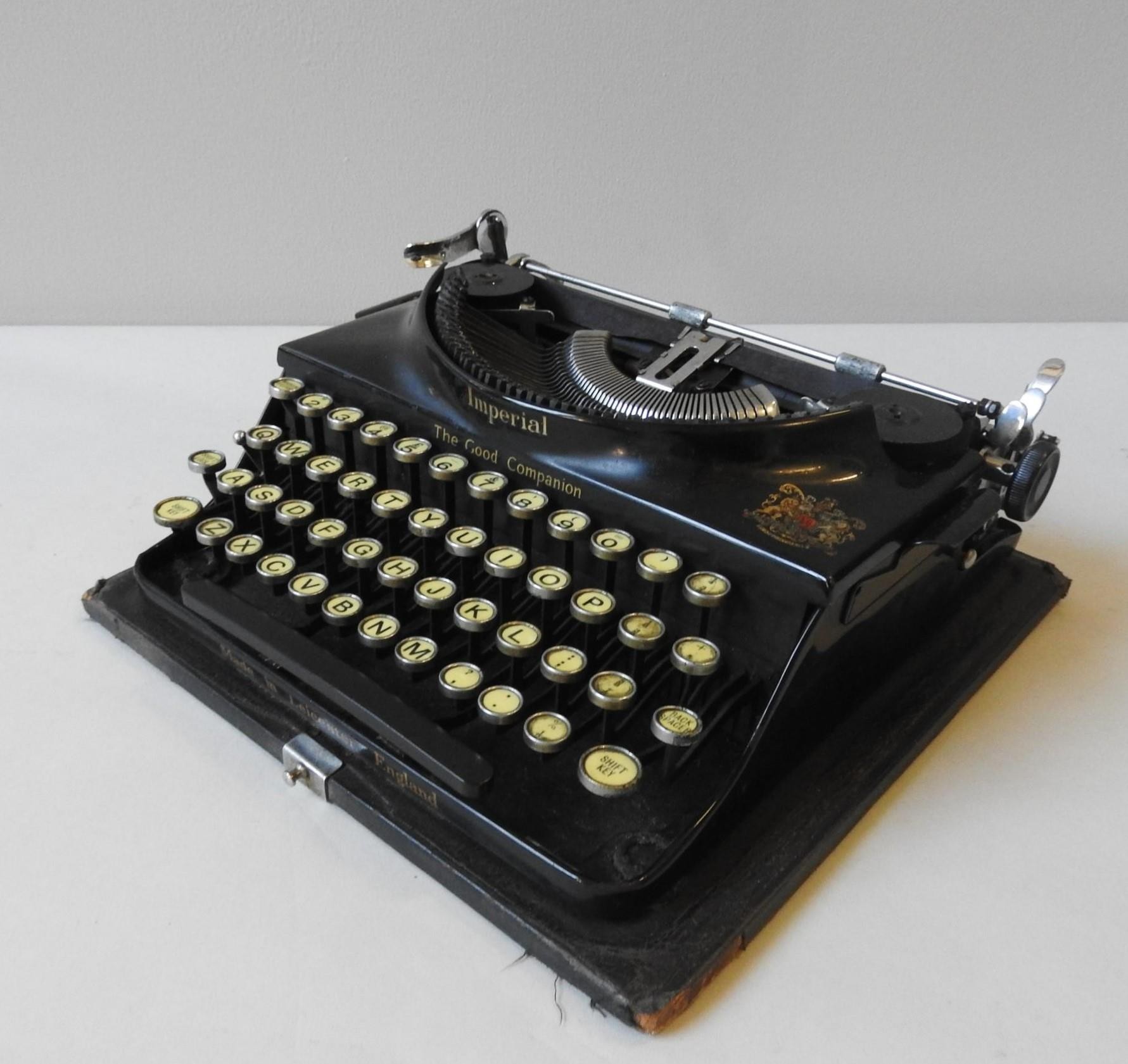 A VINTAGE IMPERIAL PORTABLE TYPEWRITER, circa 1950, ex Police issue ...