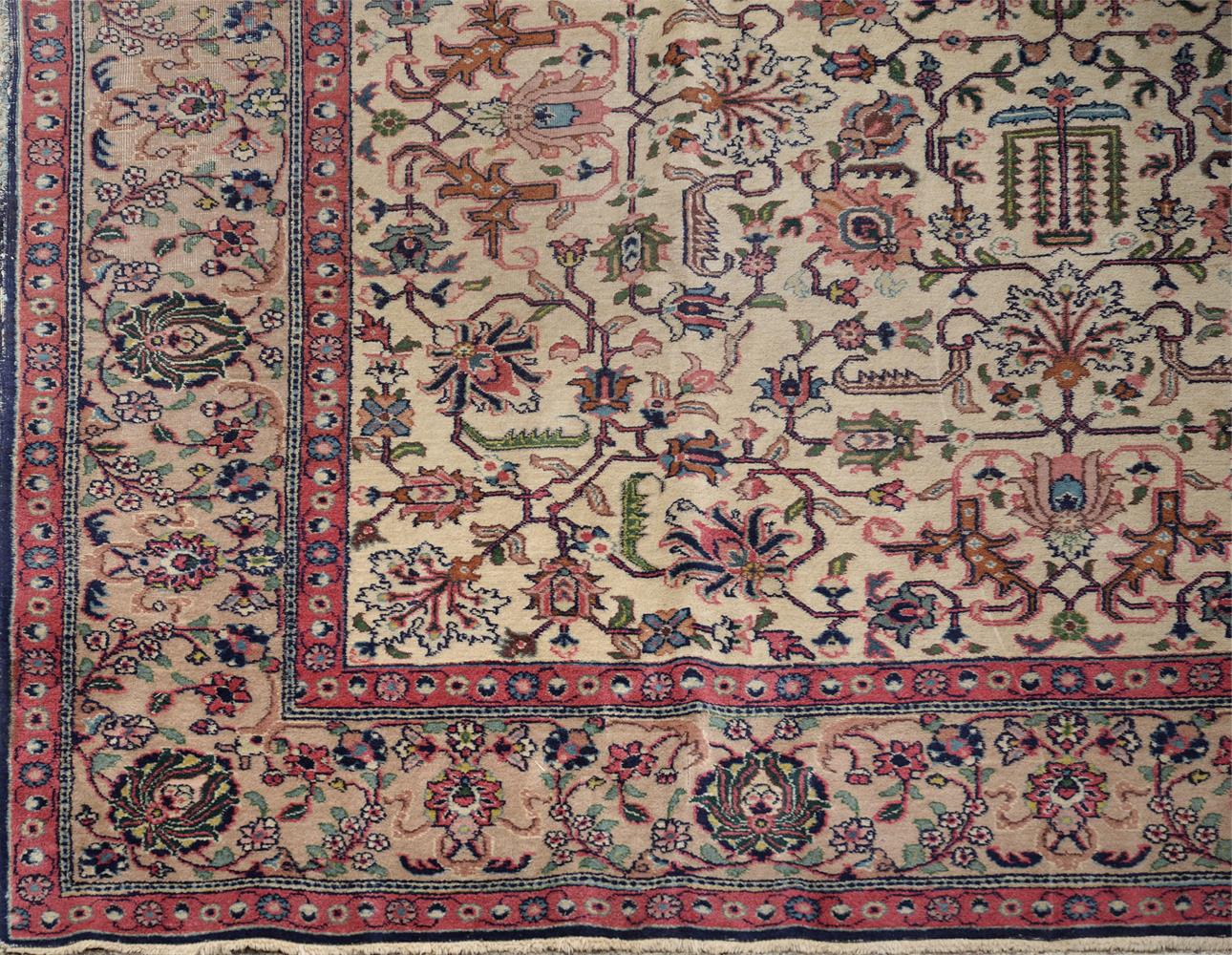 A TABRIZ CARPET SIGNED BY MASTER WEAVER JAVAN AMIR KHIZapproximately ...