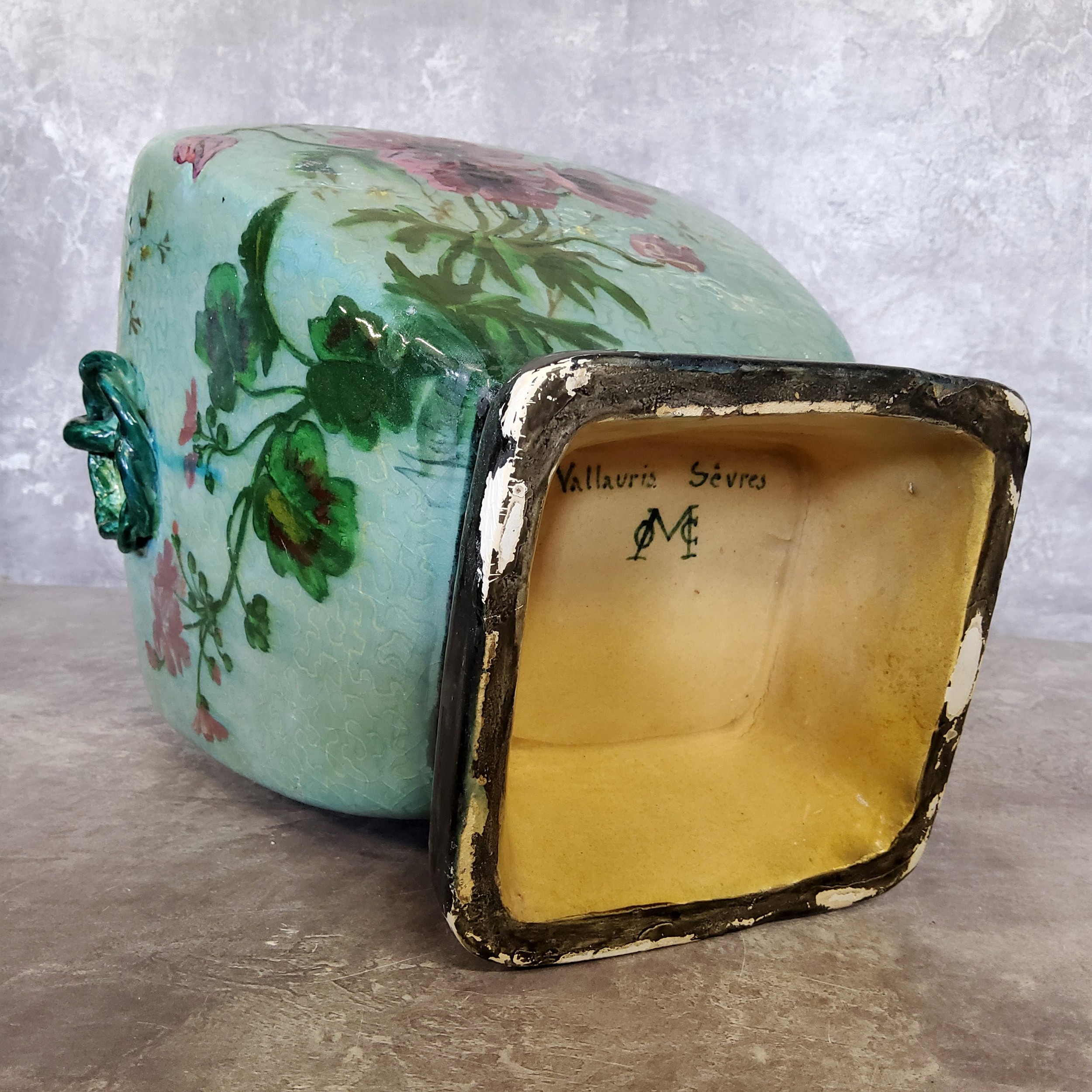 A large Vallauris Sevres pottery vase decorated with wild flower and ...