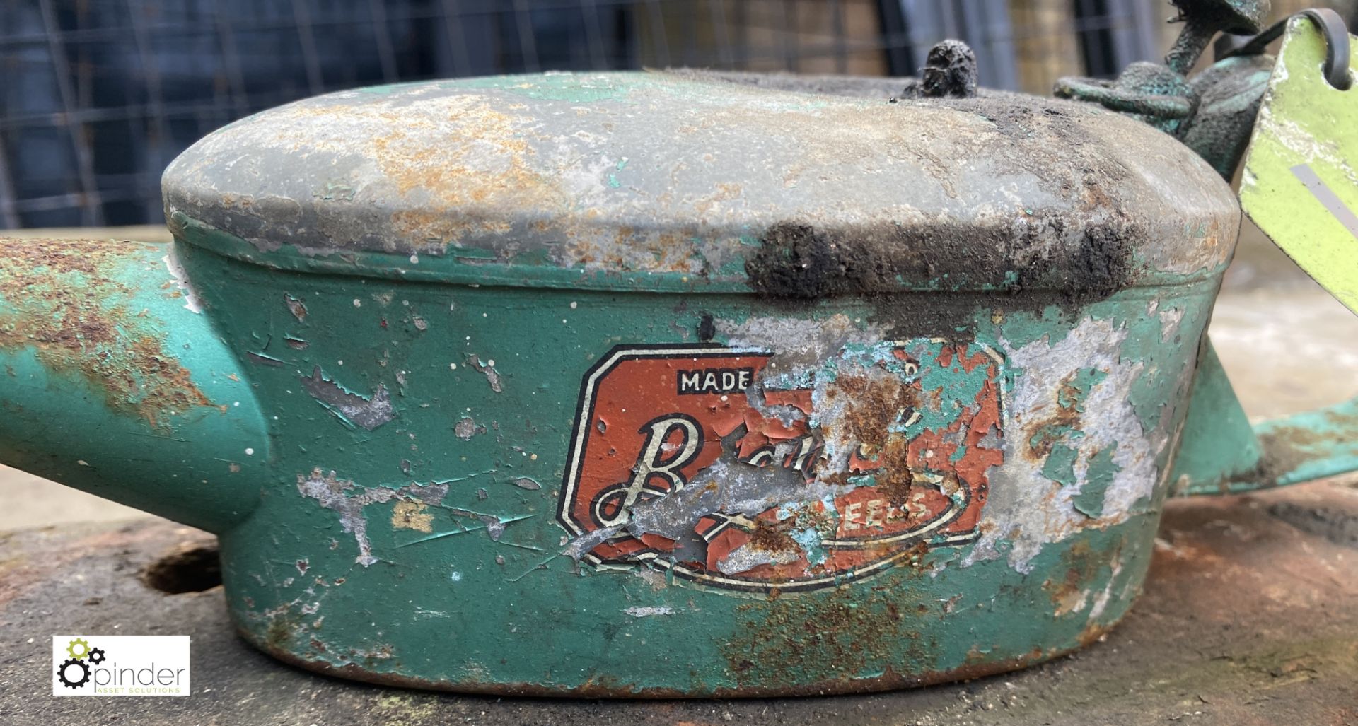 A vintage metal Oil Can