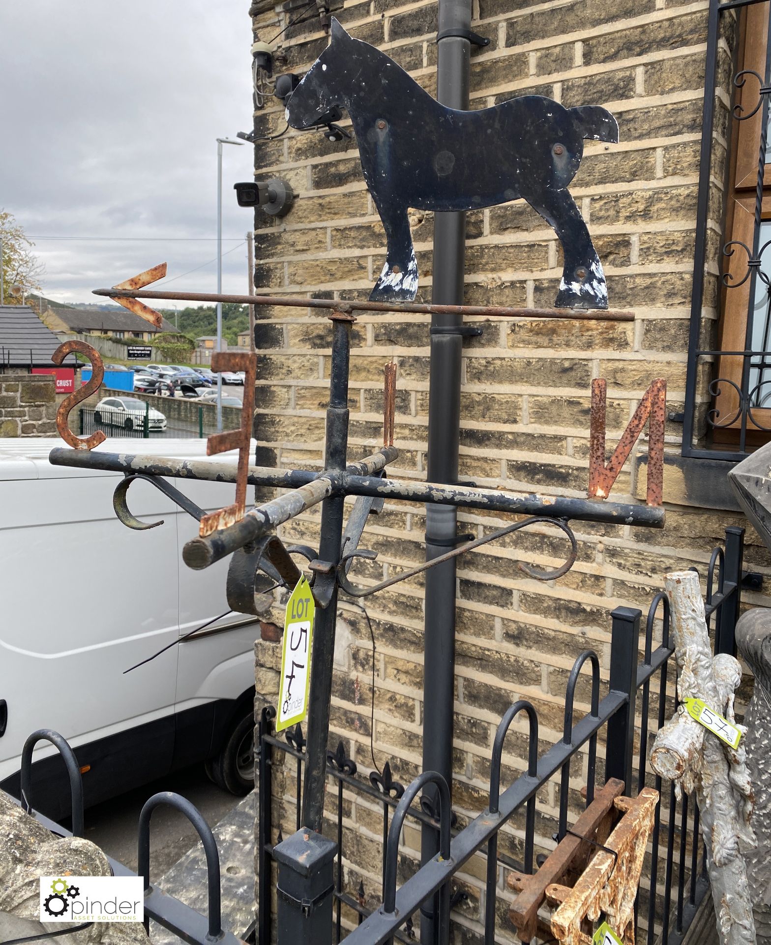 A wrought iron folk art Weather Vane, with shire horse direction ...