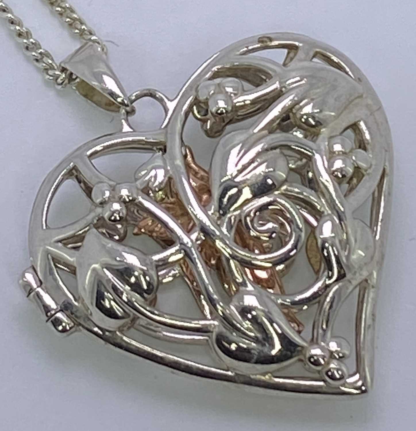 CLOGAU STERLING SILVER 'SMALL FAIRY LOCKET' - comprising a pair of ...