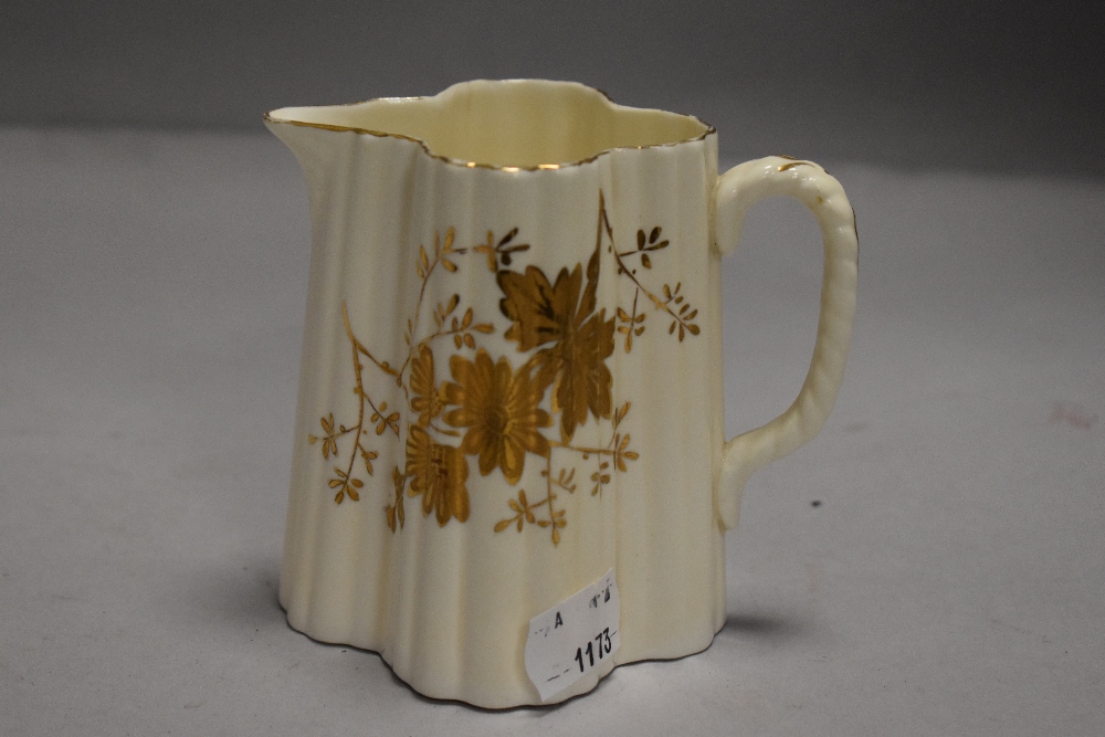 An antique Wileman Foley Shelley part tea service in a cream and gilt ...