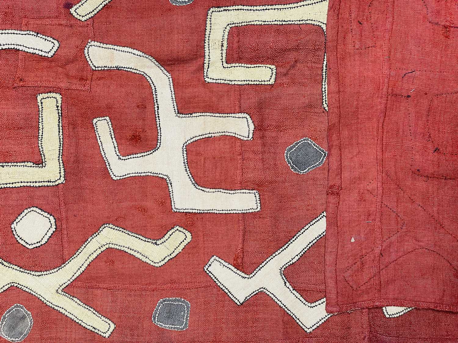 A large Kuba cloth, mid 20th century and another African textile with ...