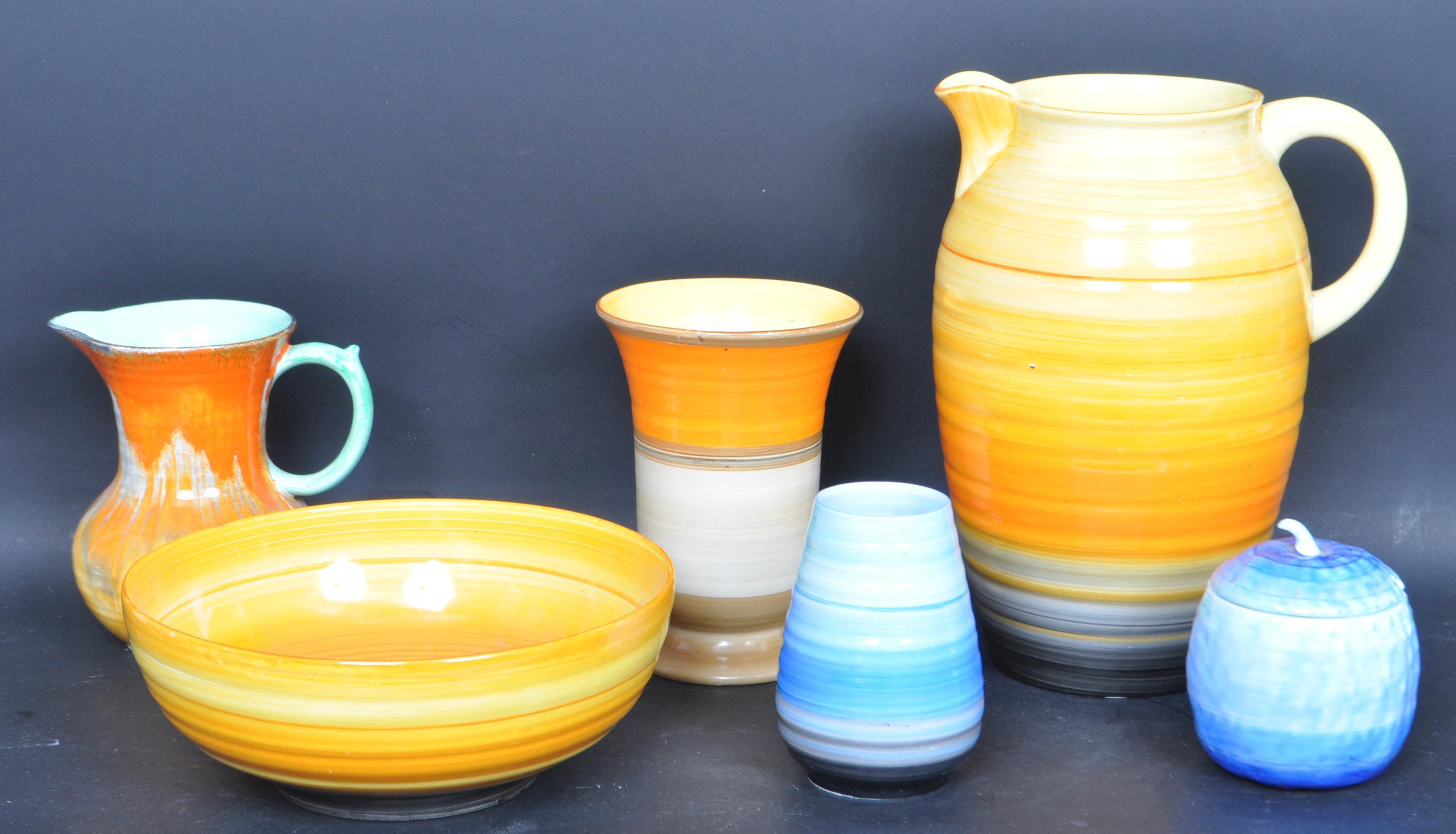 A collection of vintage 20th century Shelley pottery comprising of jugs ...