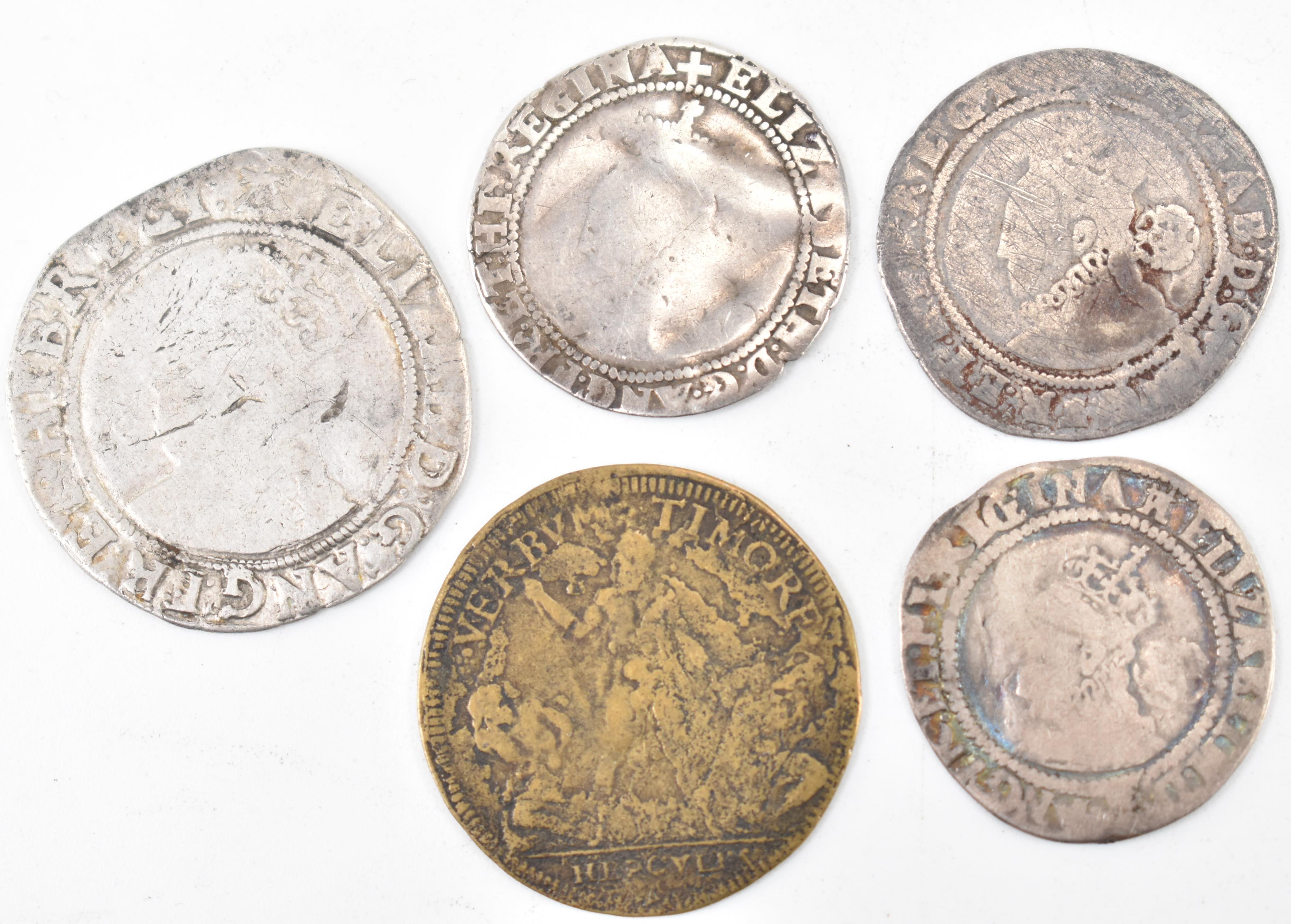 A collection of four 16th century Elizabethan silver coins comprising ...