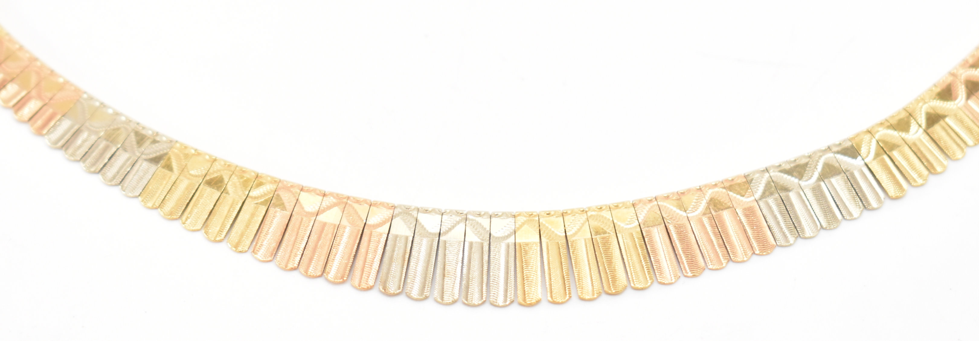 An vintage gold tri tone Cleopatra collar necklace. The necklace having ...