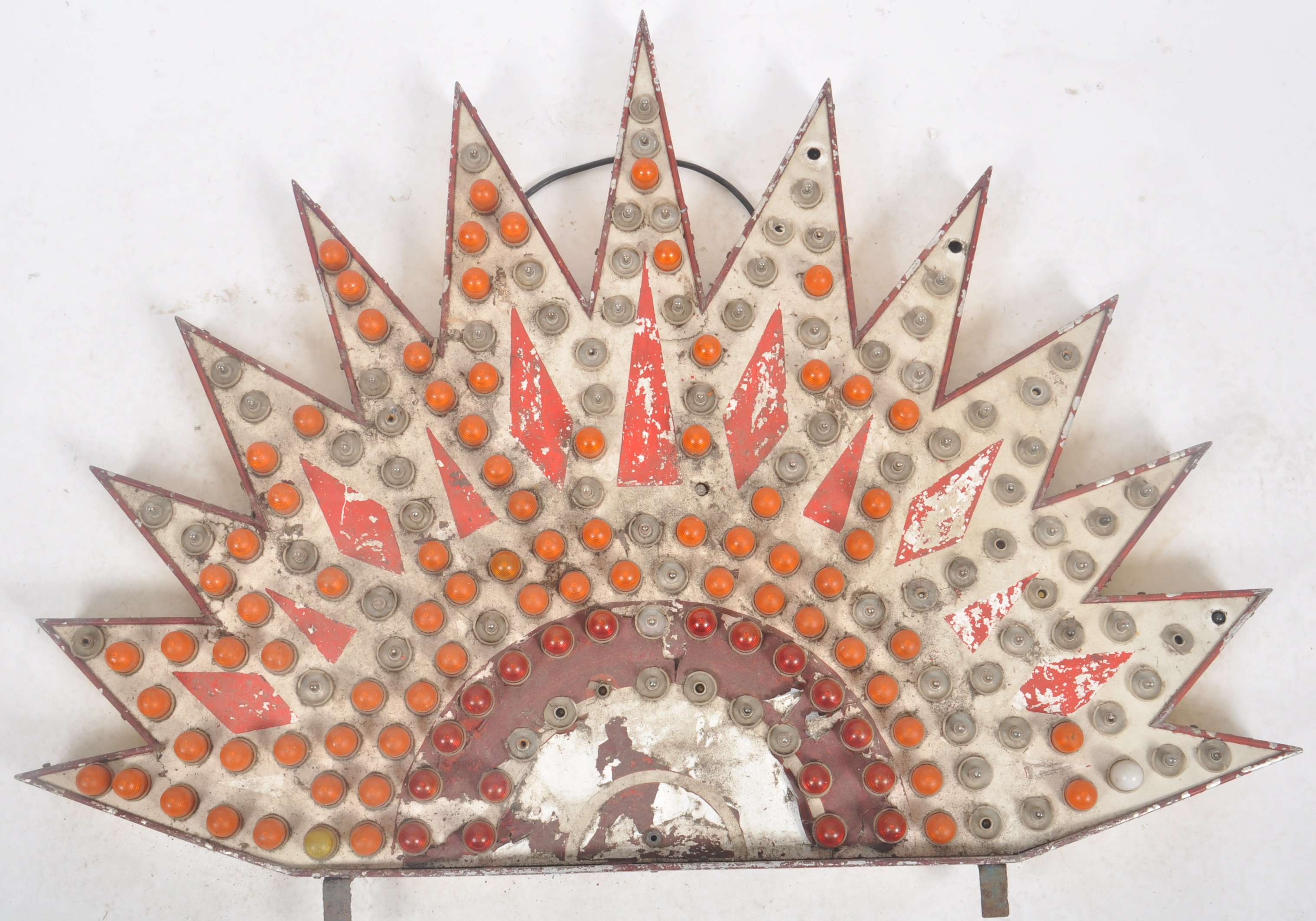 A mid 20th Century fairground / funfair half starburst light panel ...