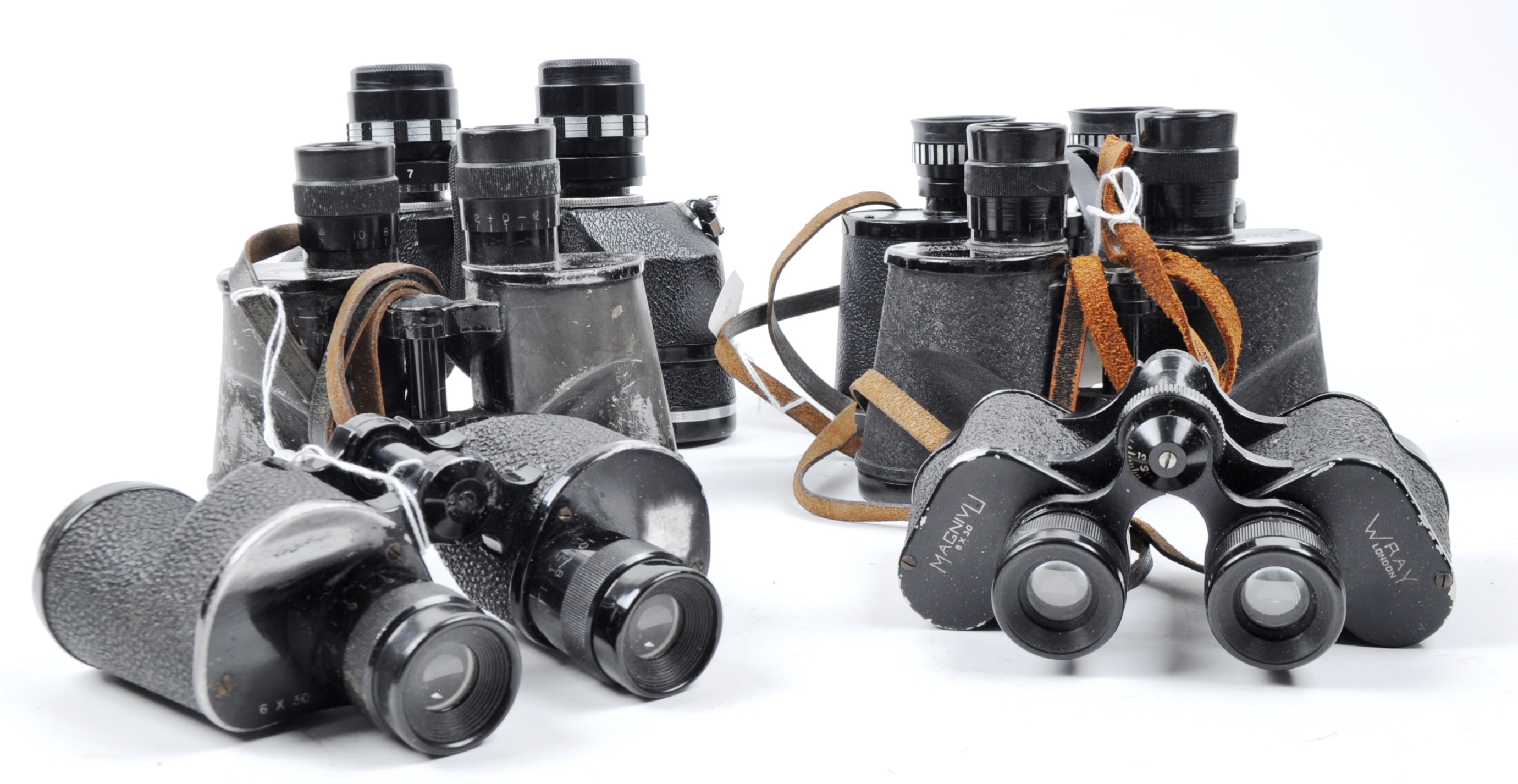 A collection of six assorted vintage binoculars. To include: R.E.L ...