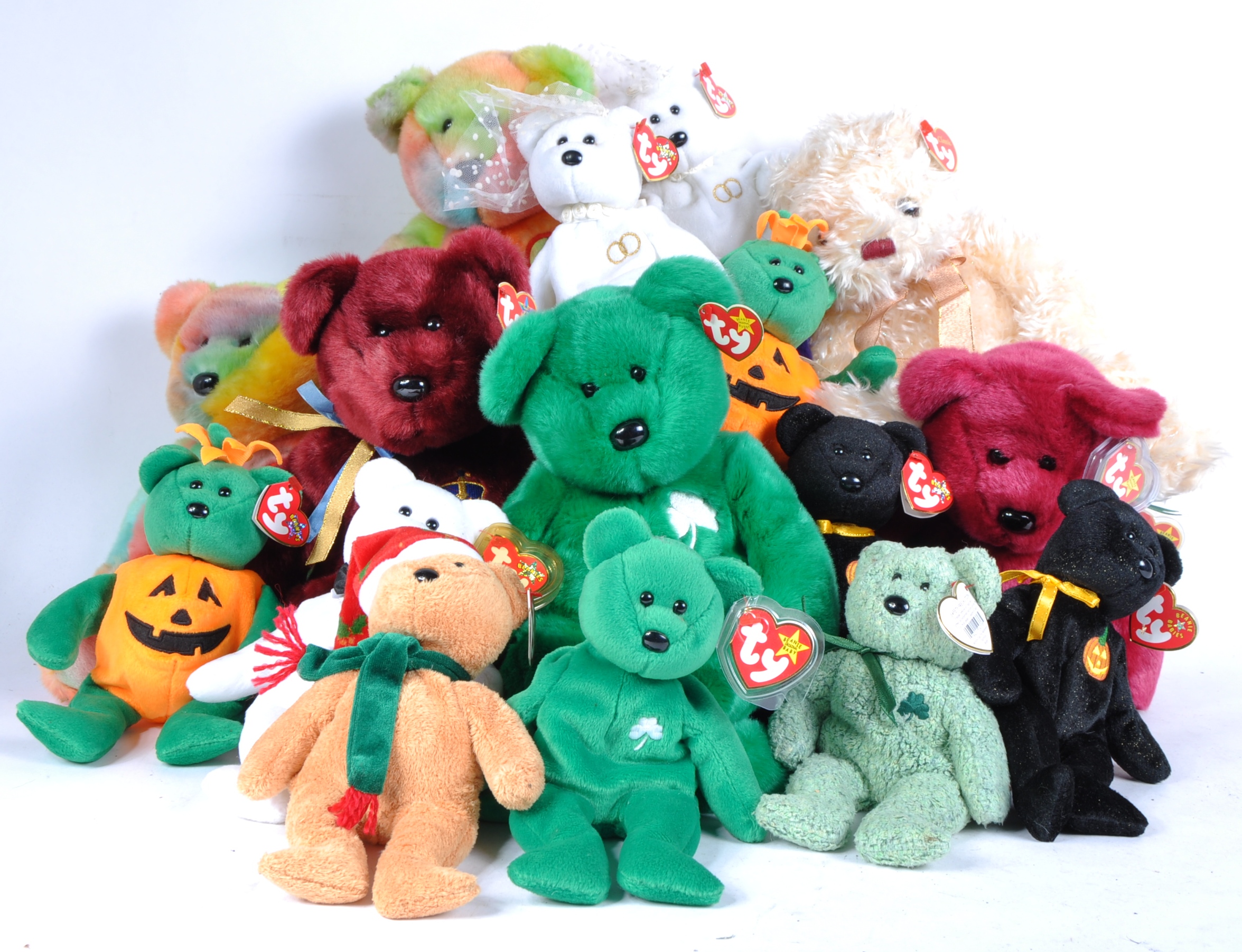 A collection of assorted vintage TY Beanie Babies soft toy teddy bears ...