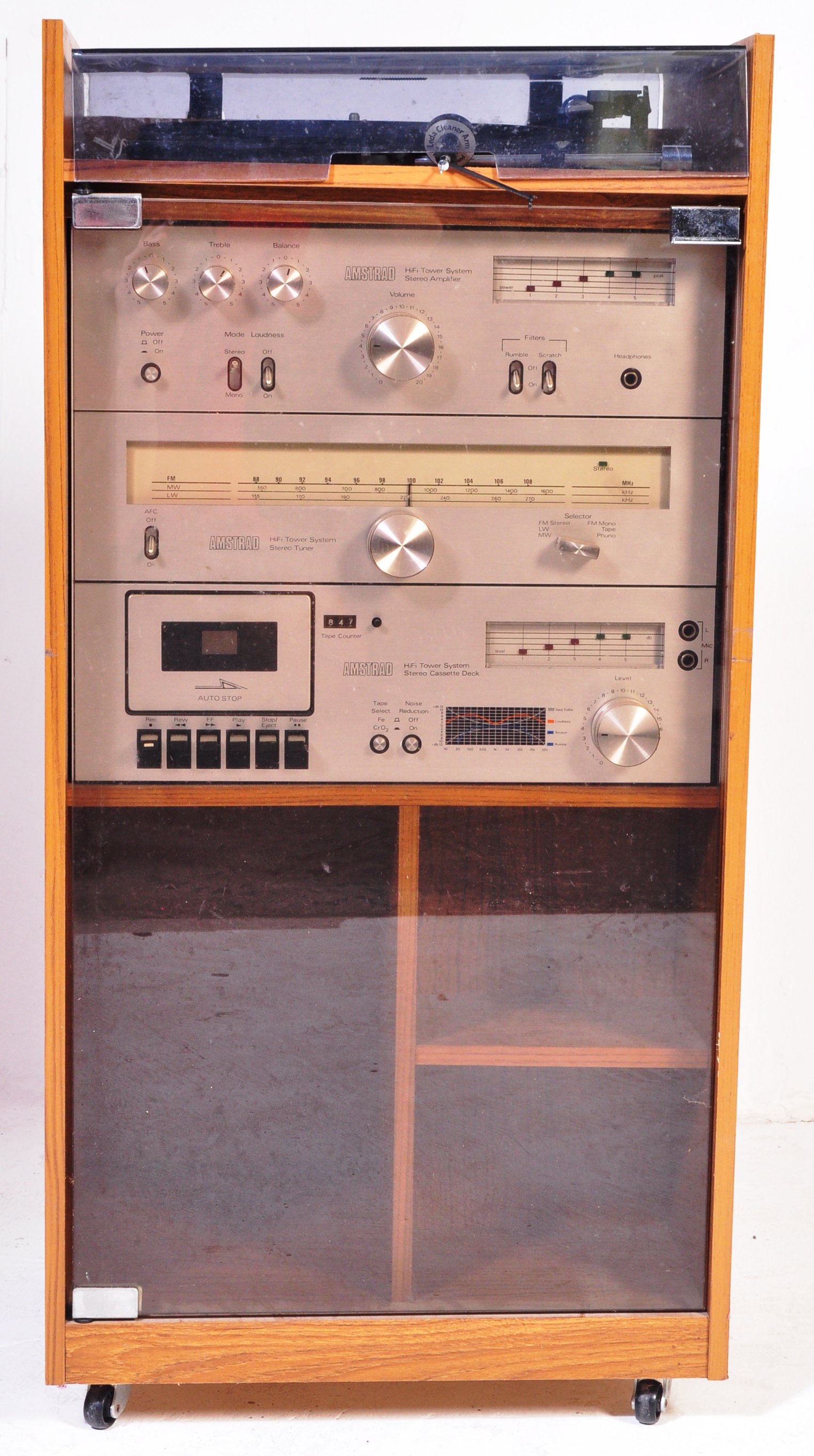 A retro 1970's hi-fi stereo system within glass and teak veneer case ...