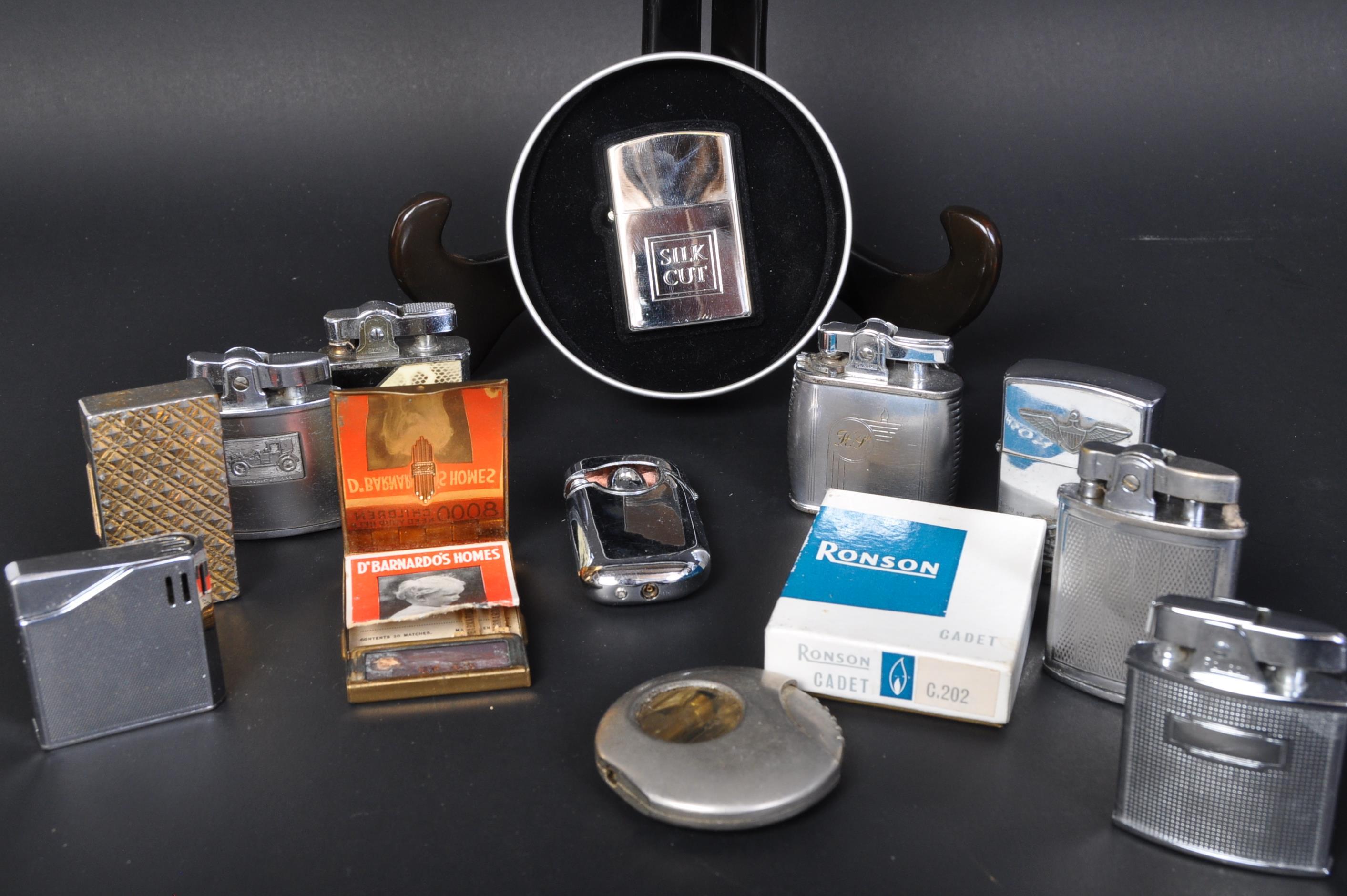 An assortment of retro vintage 20th century lighters. The lot to ...