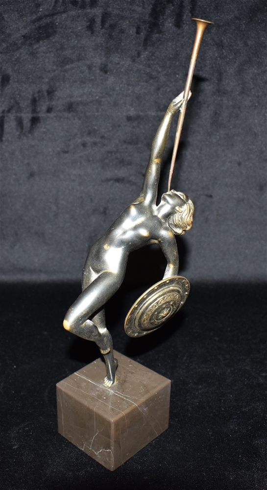 AN ART DECO PATINATED BRONZE FIGURE IN THE MANNER OF RAYMONDE GUERBE ...