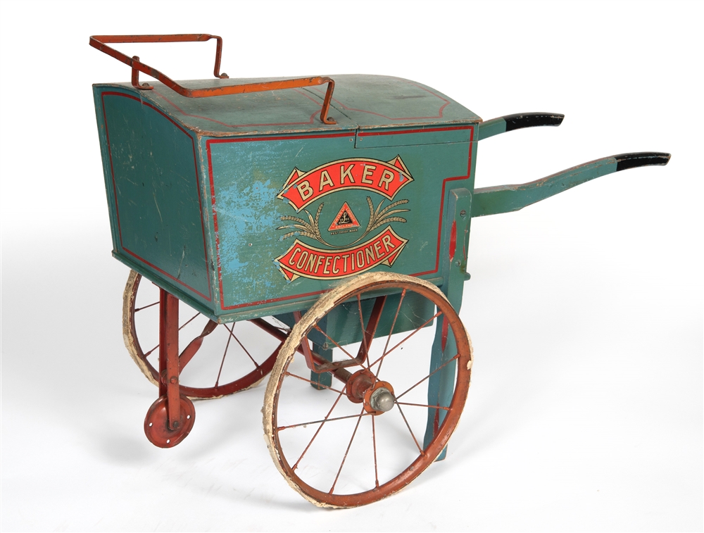 A TRI-ANG BAKER-CONFECTIONER HAND-CART the lined blue painted wood body ...