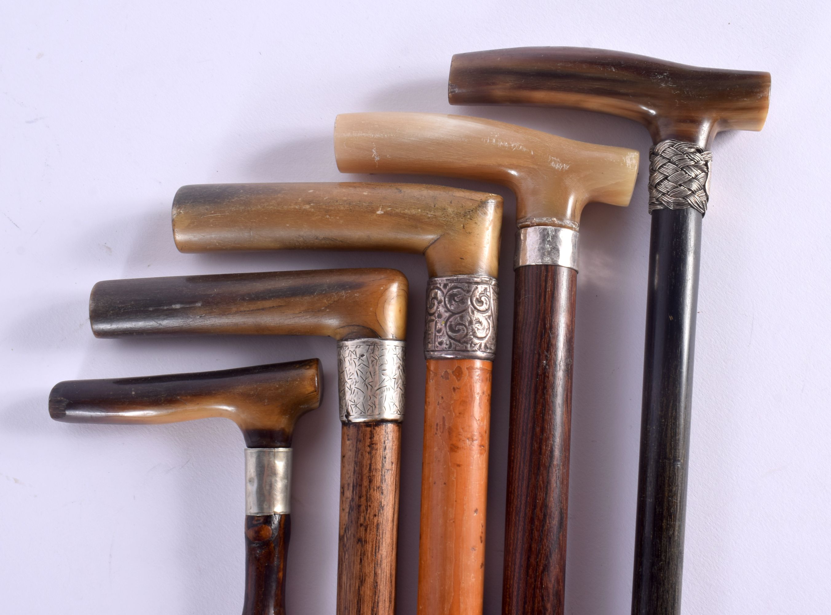 FIVE 19TH CENTURY MIDDLE EASTERN CARVED RHINOCEROS HORN WALKING CANES ...