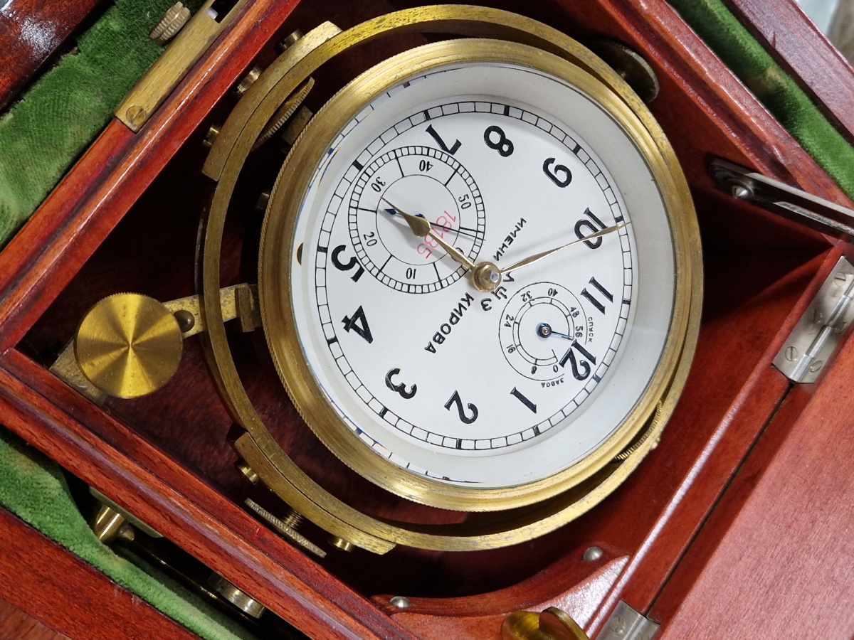 A RUSSIAN MARINE CHRONOMETER WITHIN DOUBLE WOODEN CASES OF MAHOGANY ...
