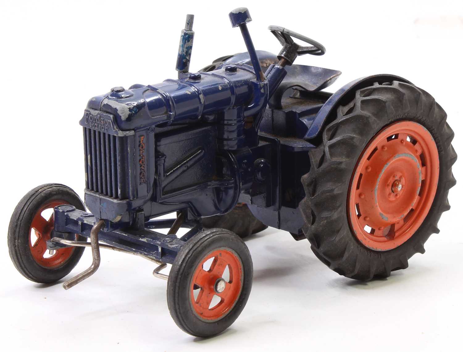 A Chad Valley No. 9235 Fordson Major tractor comprising dark blue body ...