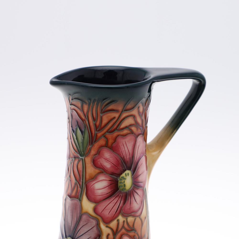 MODERN MOORCROFT JUG - COSMOS. A slender jug in the Cosmos design ...