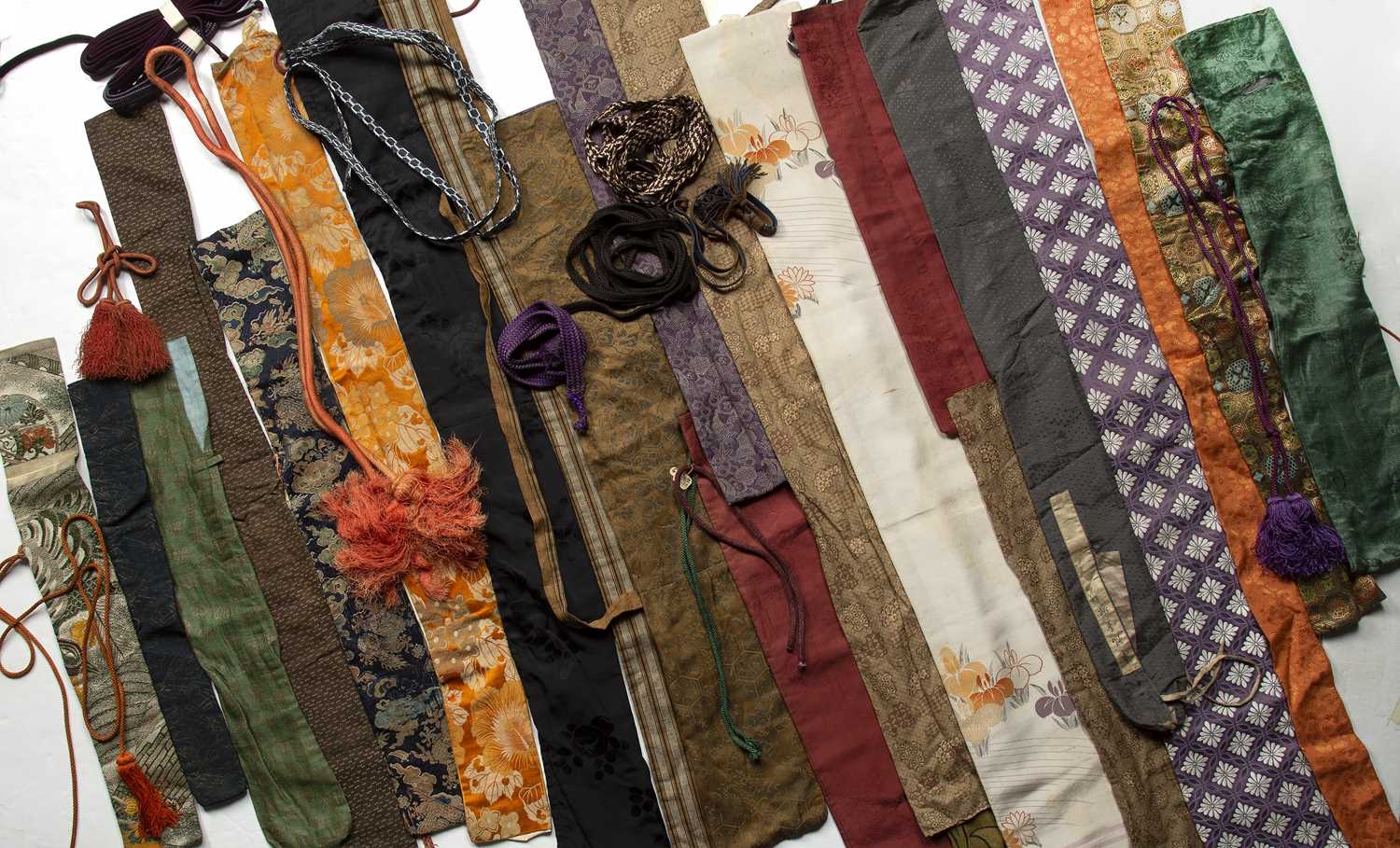 Large collection of silk and other katana cases and ...
