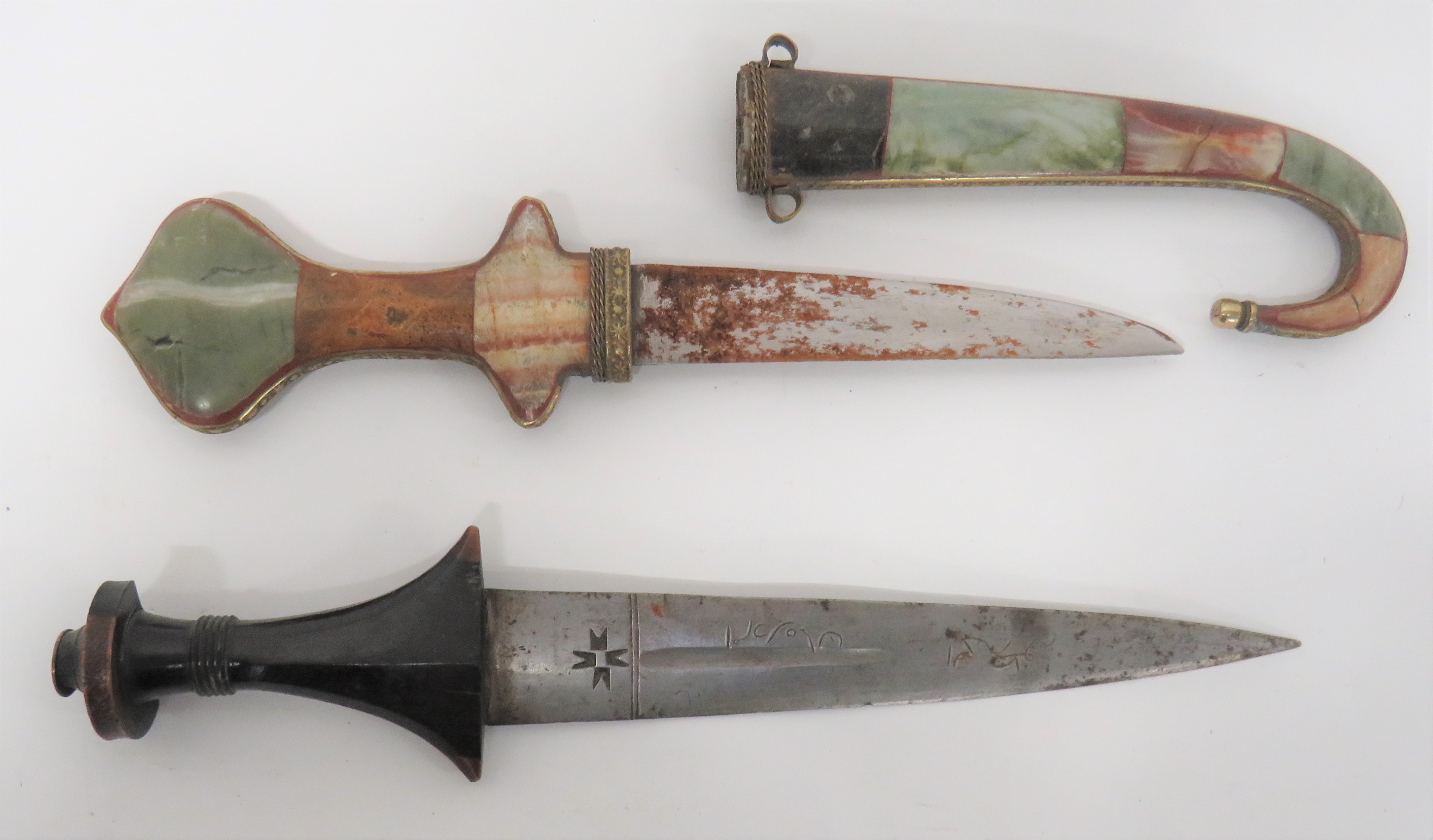 Two African Knives consisting marble inlaid jambiya. 6 1/4 inch, double ...